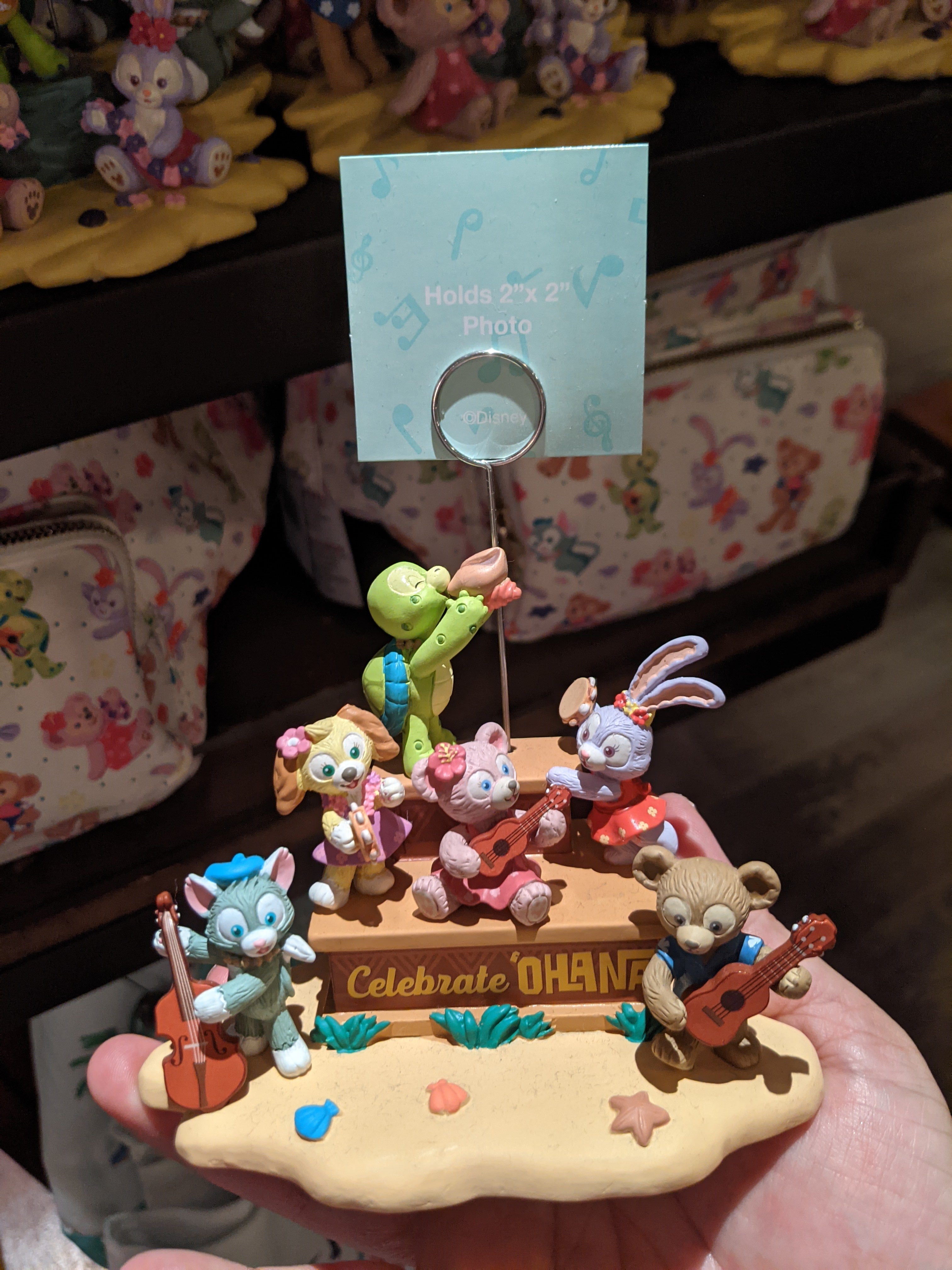 Duffy and Friends with Olu Blowing Conch Shell Photo Holder